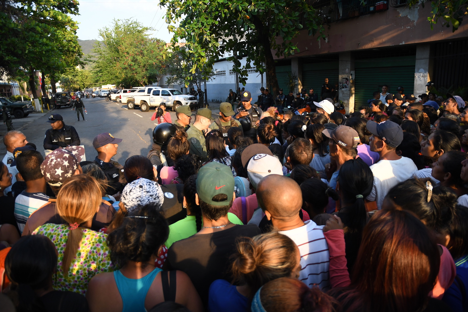 A fire started during a riot at a Venezuelan police station kills 68