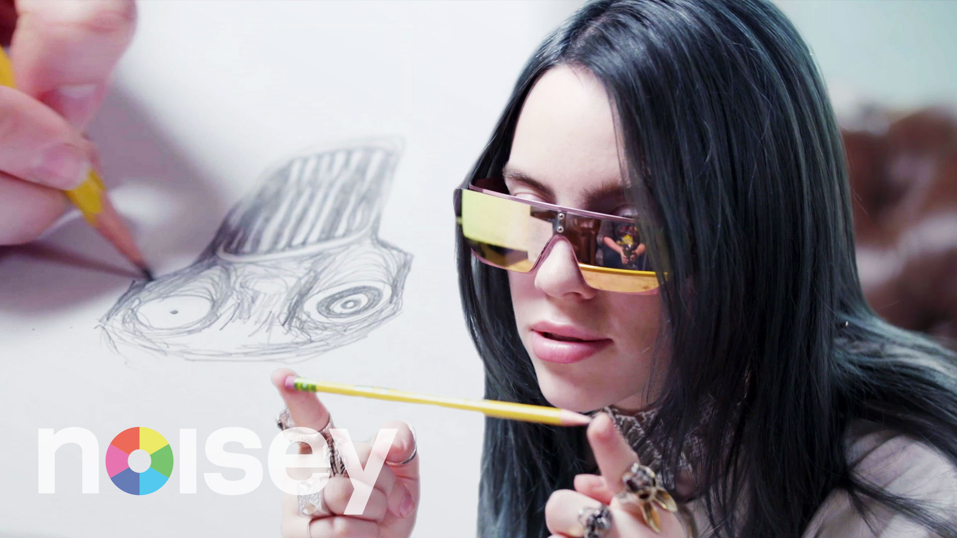 Watch Billie Eilish Talk ‘Spirited Away’ While Drawing Her Self-Portrait